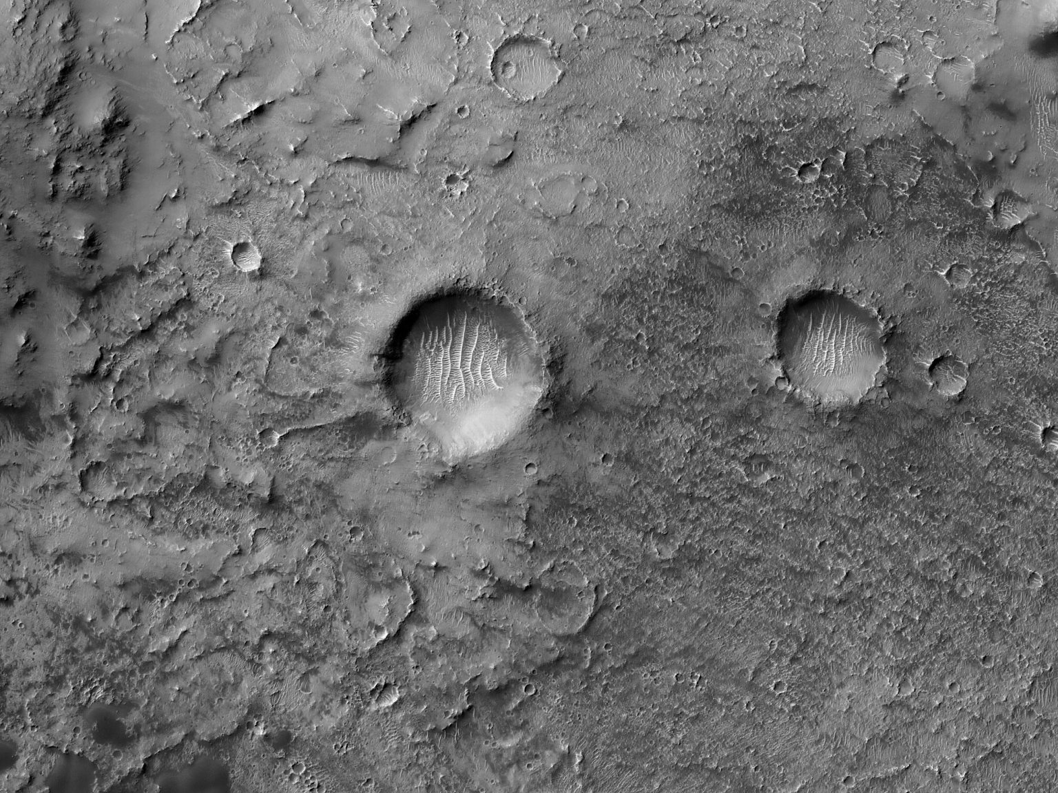 Breathtaking NASA Photo of Martian Crater Looks Like “Alien Footprint”