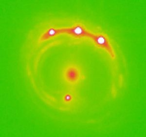 Quasar Microlensing Reveals Planets in Extragalactic Galaxies