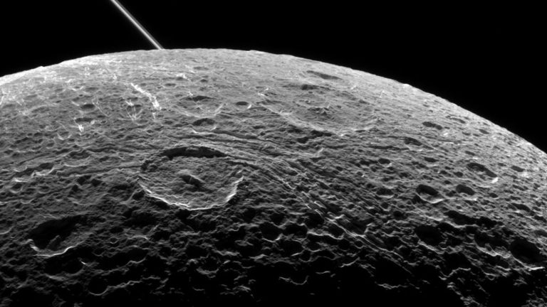 Cassini Images Captures Dione Dwarfing Rhea