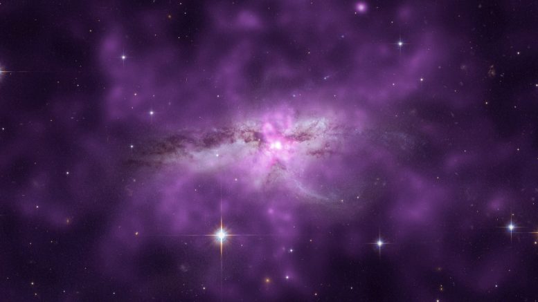 Chandra Reveals an Enormous Cloud of Hot Gas Enveloping Two Colliding ...