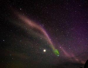 Astronomers Solve the Mystery of Purple Lights in the Upper Atmosphere