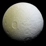 Cassini Reveals Unusual Red Arcs on Saturn's Moon Tethys