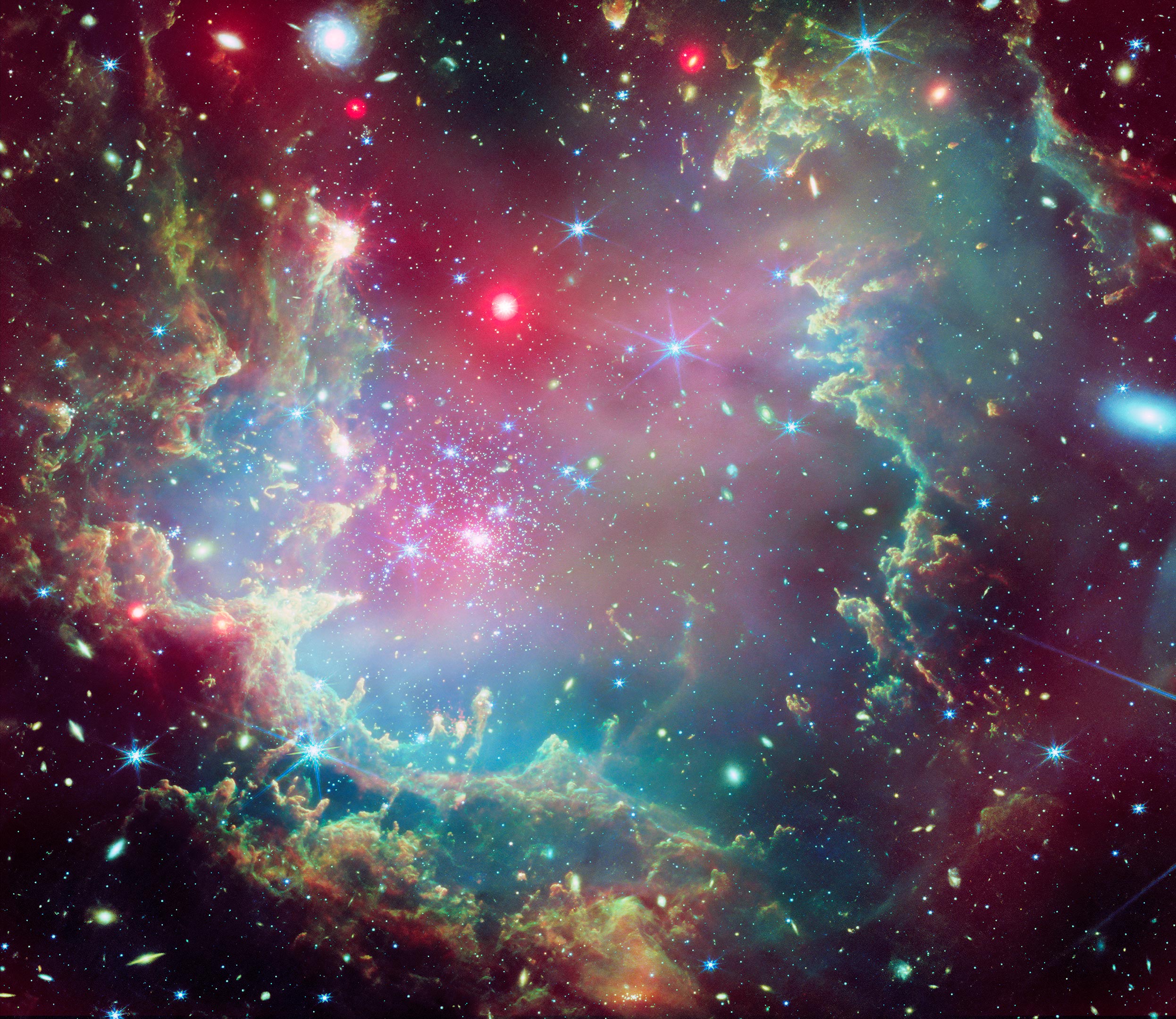 NASA Reveals Cosmic Christmas Tree and Celestial Wreath Illuminating ...