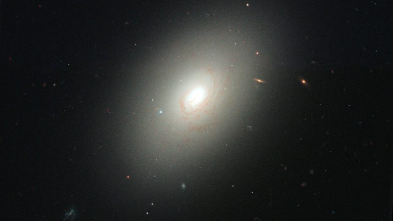 Hubble Views Interacting Galaxy Duo Arp 142