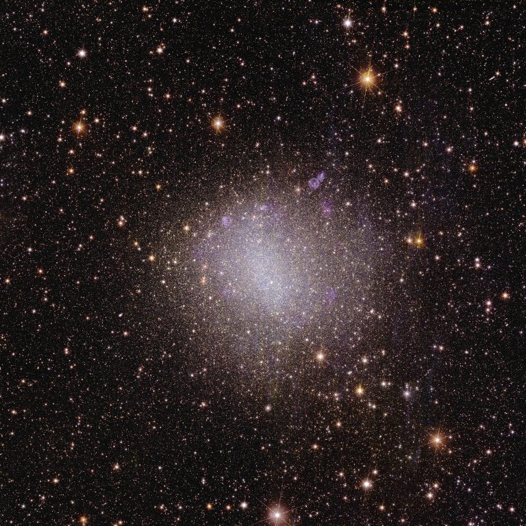 Mapping Cosmic Evolution: Euclid’s Insightful Infrared Snapshot of NGC 6822