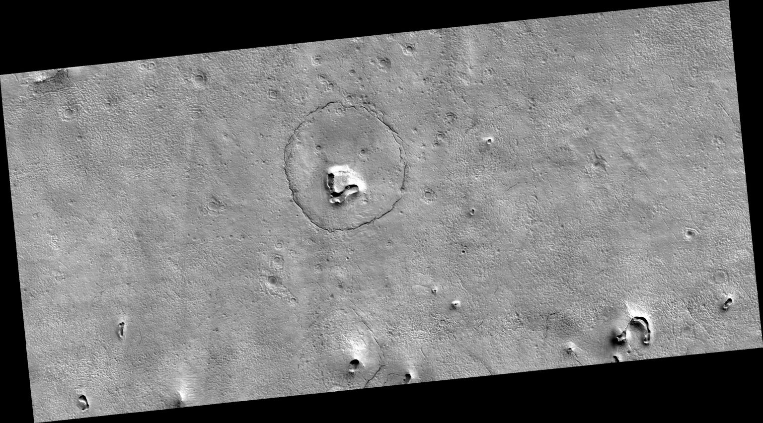 NASA’s HiRISE Captures a Bear’s Face on Mars – What Is It Really?