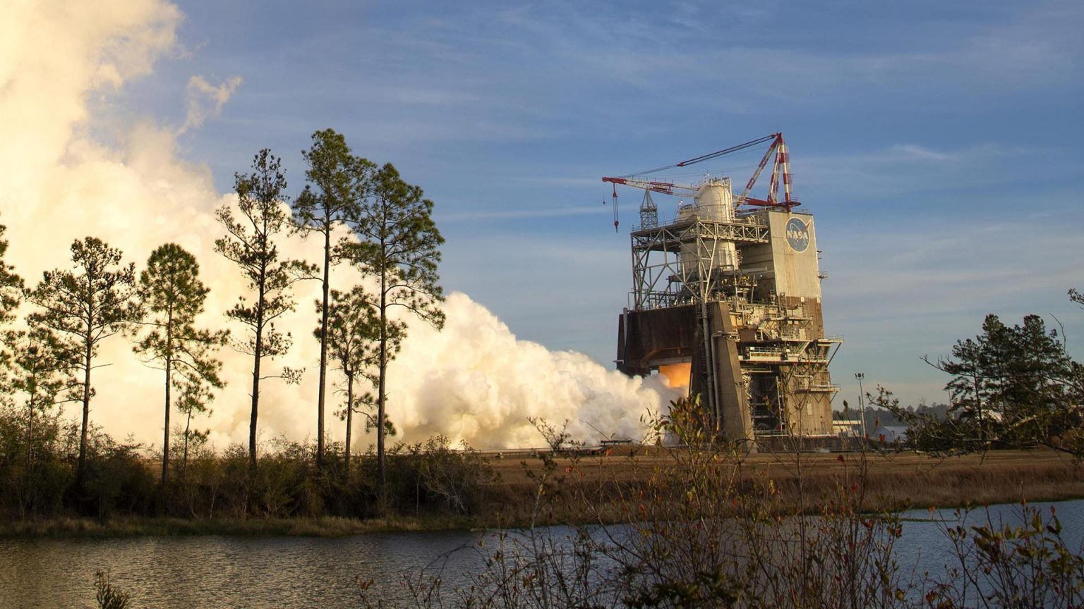 NASA Conducts Hot Fire Test of RS-25 Engine for Artemis SLS Moon Rocket