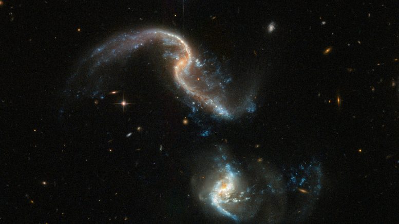 Galaxy Zoo: Hubble Captures a Tumultuous Galactic Trio