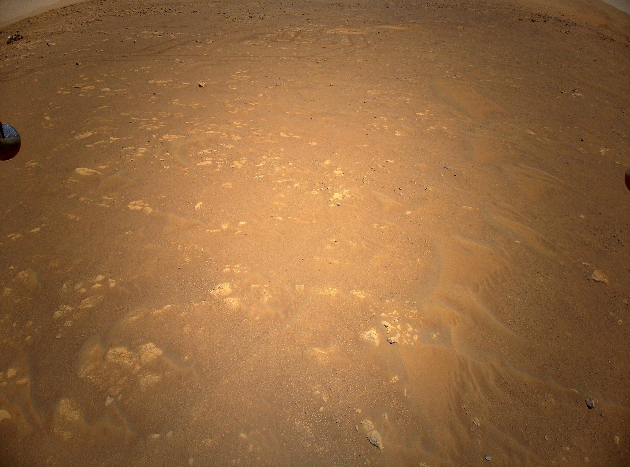 NASA's Ingenuity Helicopter Spots Perseverance Mars Rover From the Air