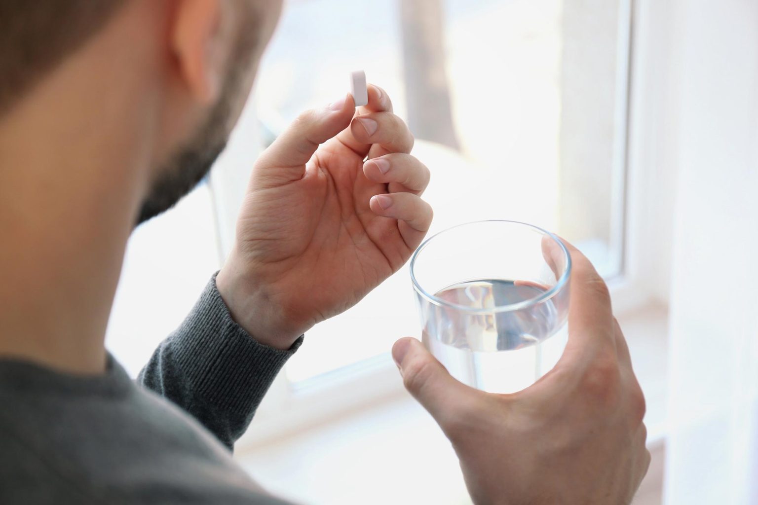 Relieve Headaches Faster: Scientists Reveal the Best Way To Swallow Pills