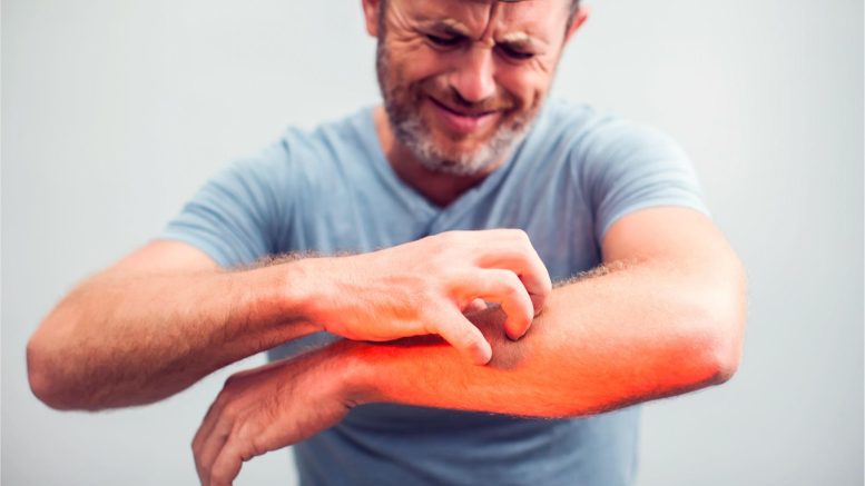 Cassini Image of Tethys and Saturn's Rings