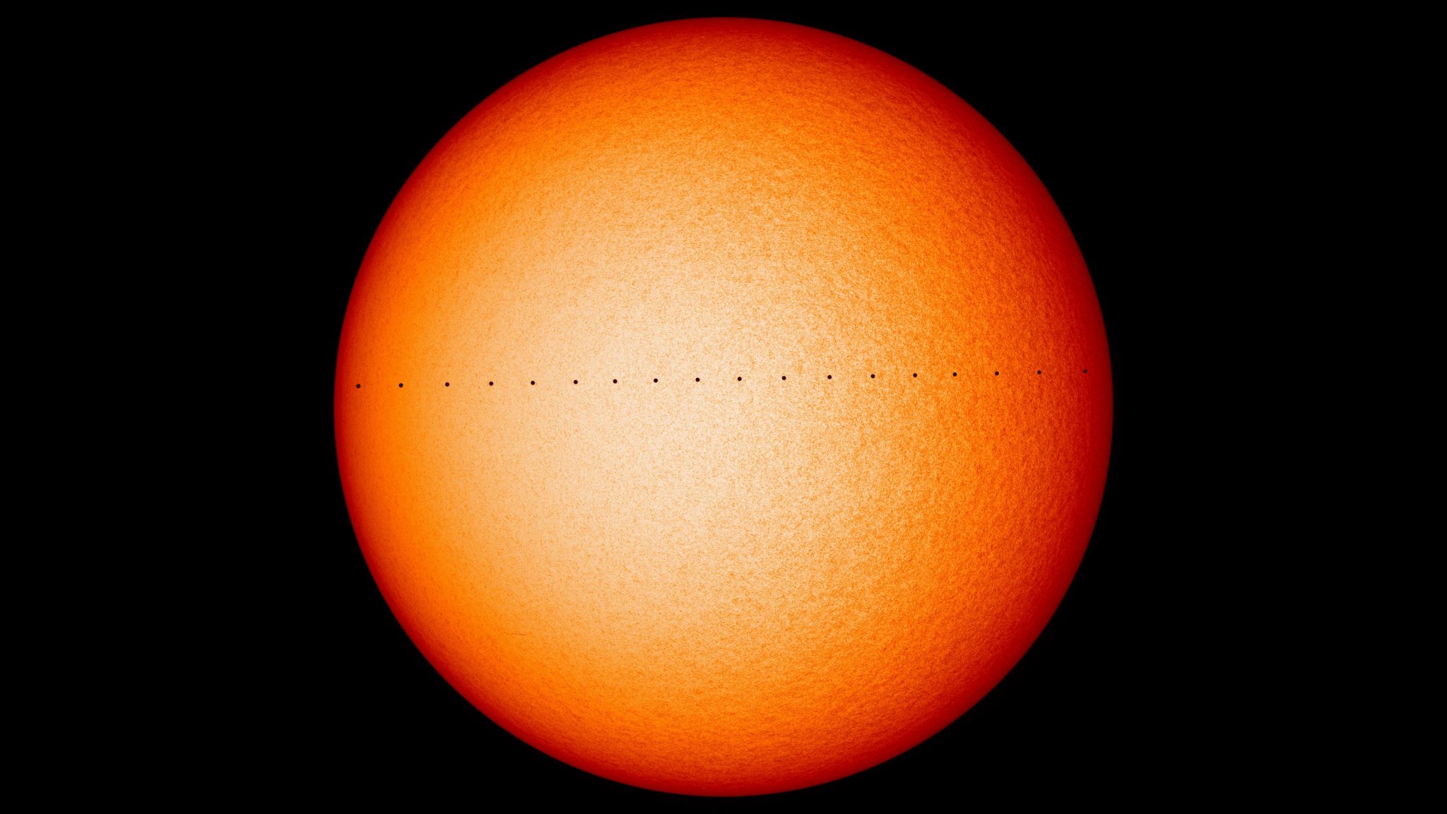 Spectacular New Images Capture the Space Station Cruise Across the Sun