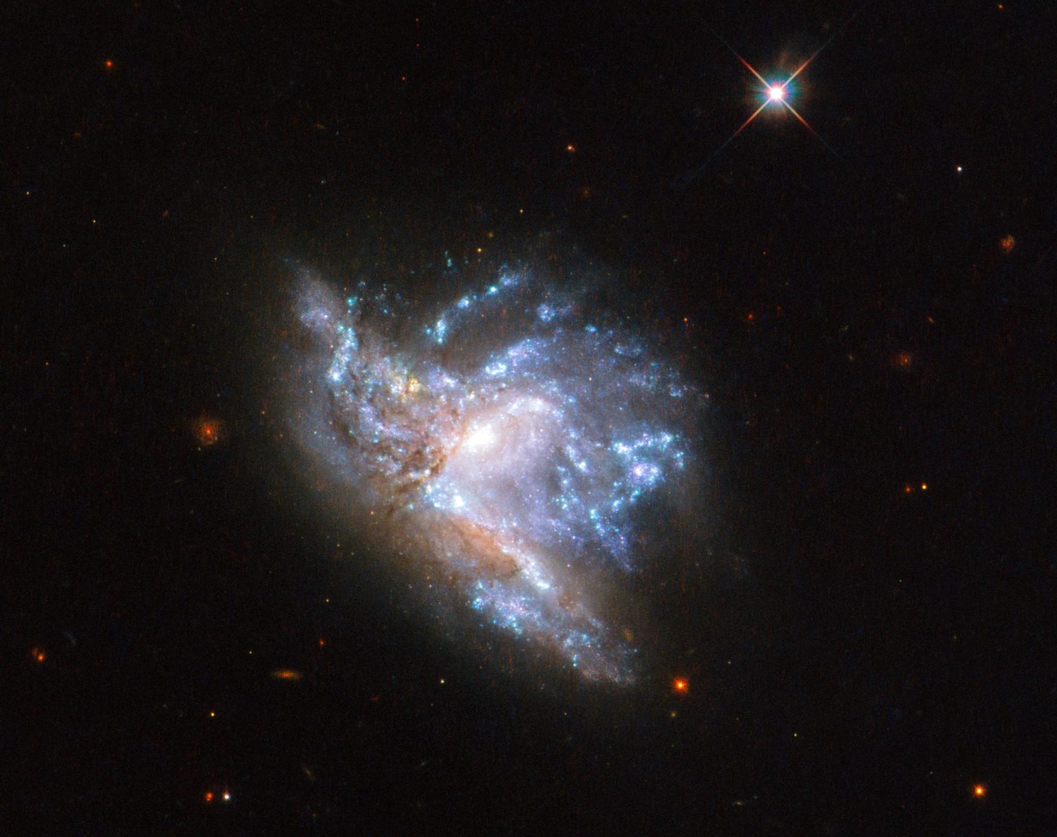 When Galaxies Collide: Hubble Showcases 6 Magnificent Galaxy Mergers