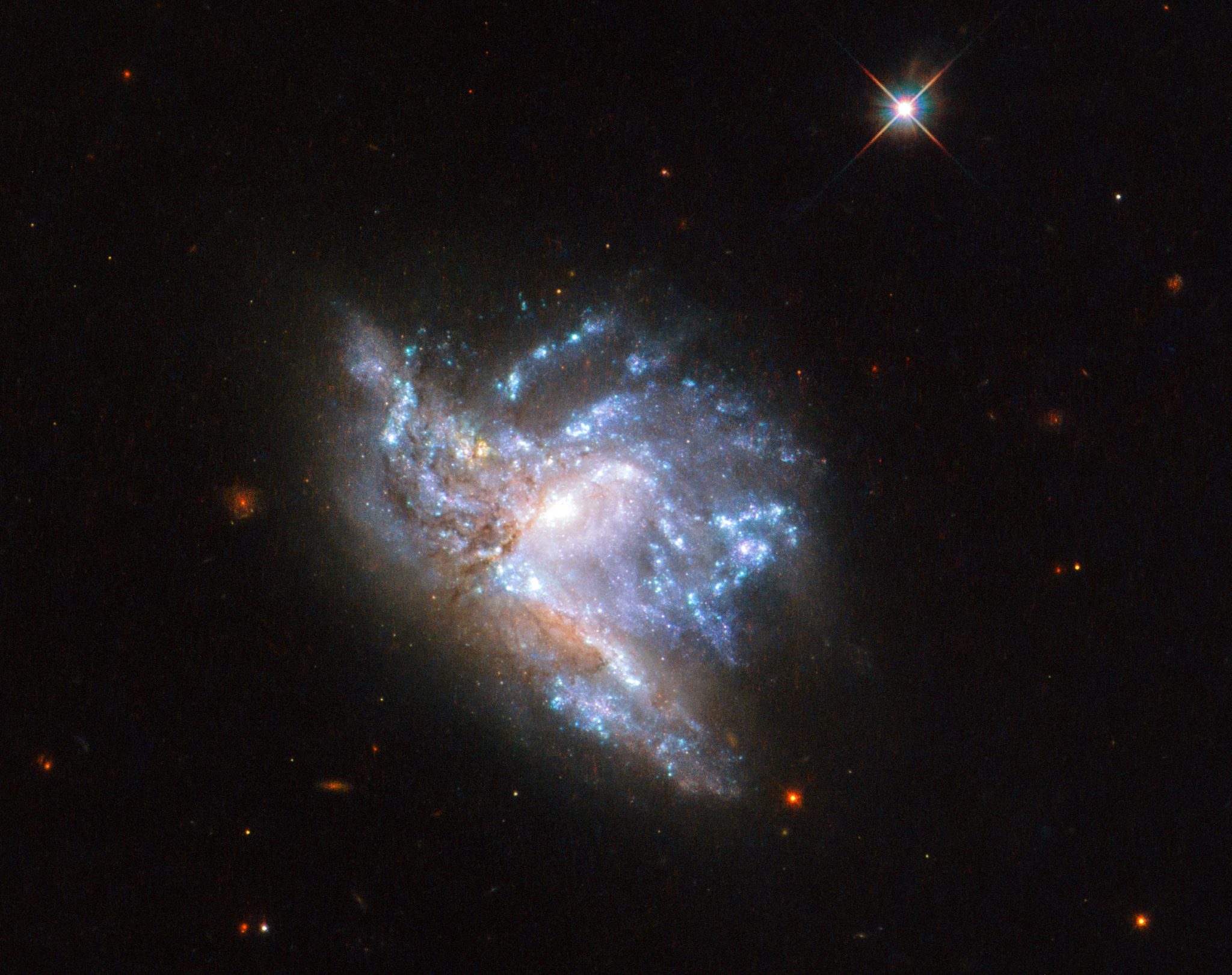When Galaxies Collide: Hubble Showcases 6 Magnificent Galaxy Mergers