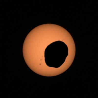 Eerie Eclipse on the Red Planet: NASA’s Perseverance Spots “Googly Eye ...