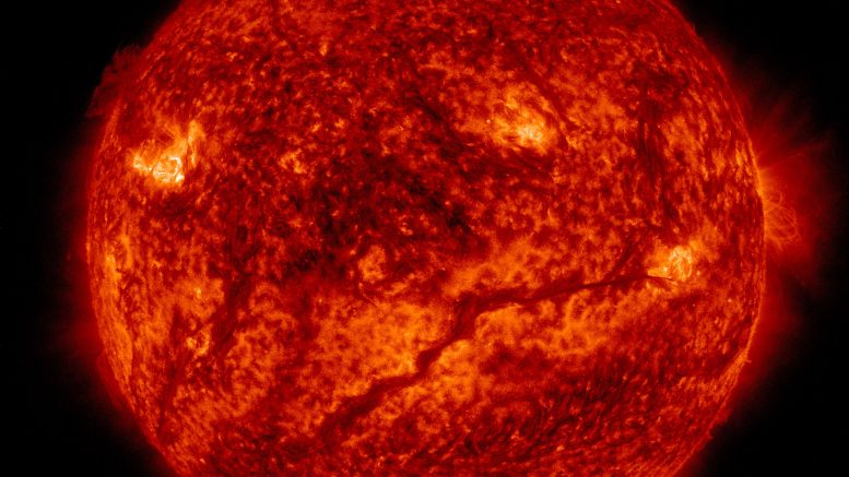 NASA's Solar Dynamics Observatory Views Rare Encircling Filament