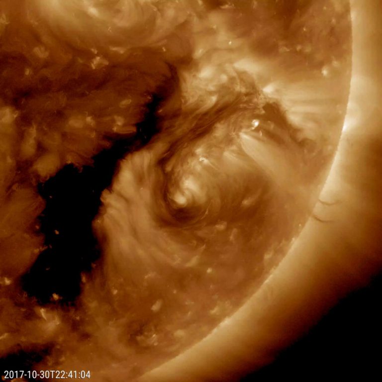 NASA's Solar Dynamics Observatory Views Rare Encircling Filament