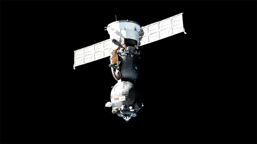 Astronaut and Cosmonauts Fly Soyuz Crew Ship to New Docking Port on ...