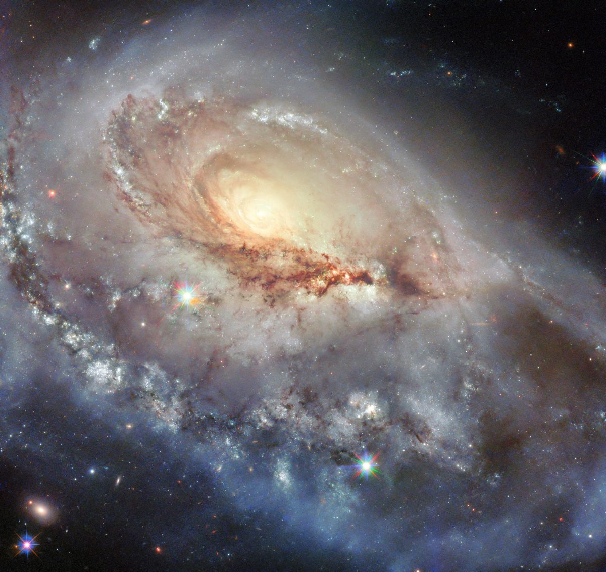 The One-Armed Wonder: Hubble Captures a Twisted Galaxy in Dazzling Detail