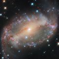 Galactic Gaze: A Cosmic Eye Watching From 76 Million Light-Years Away