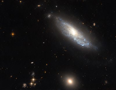 Hubble Explores Aftermath of Catastrophic Stellar Explosion in NGC 298