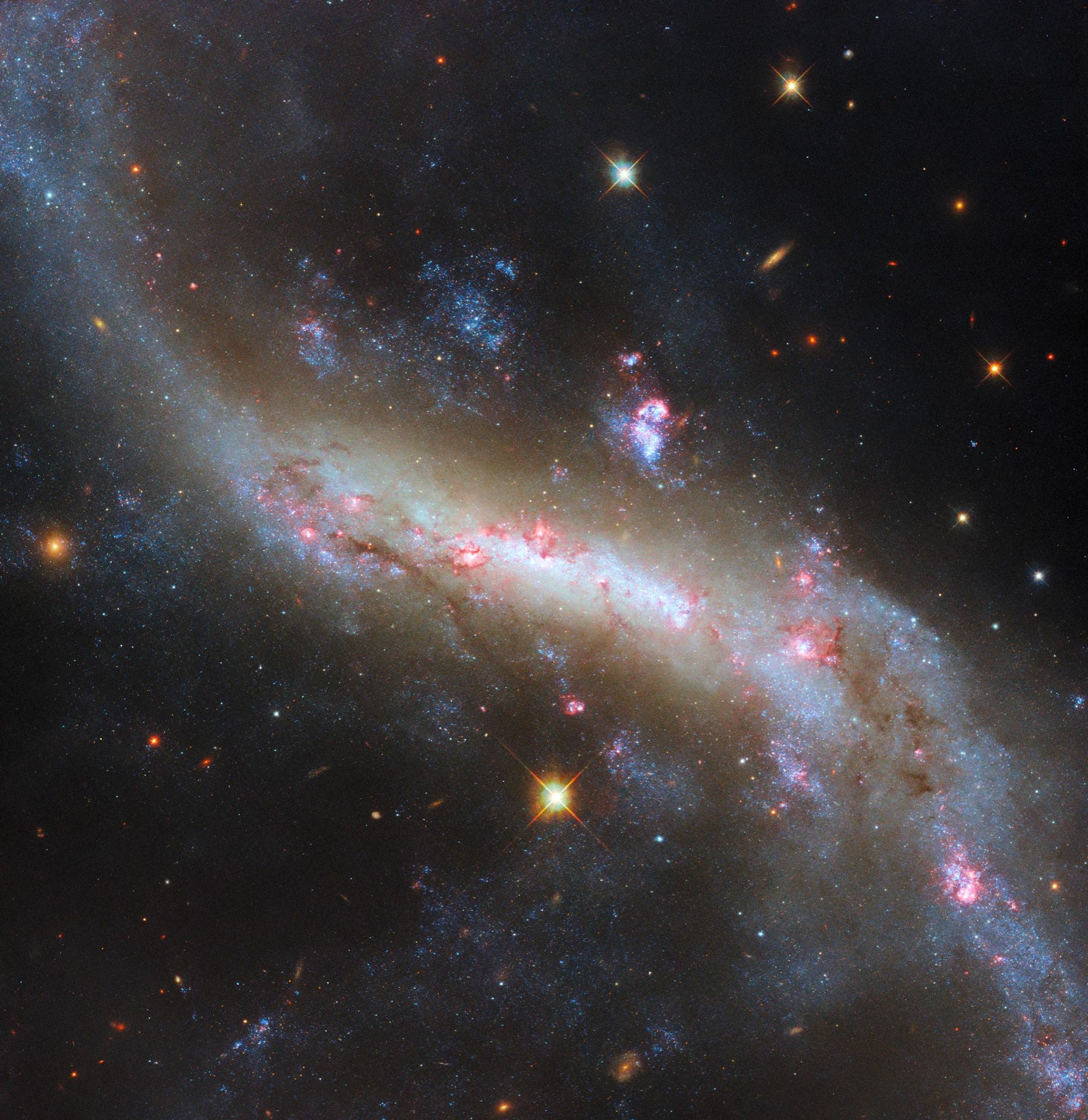 Spiral Spectacle: Hubble Explores a Cosmic Marvel in the Virgo Cluster