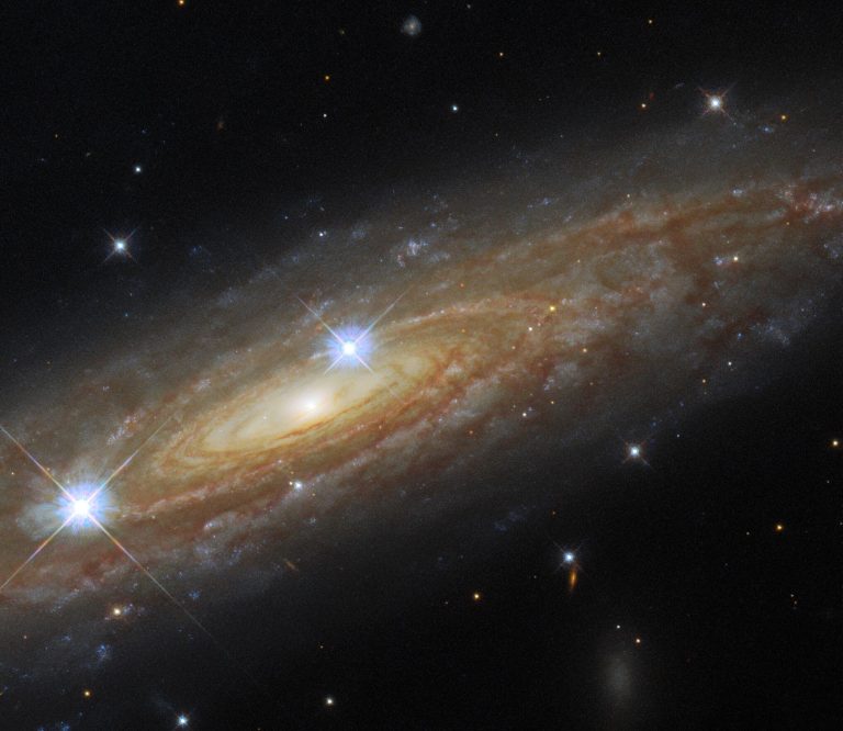 Hubble Space Telescope Captures a Majestic Spiral Galaxy 230 Million ...