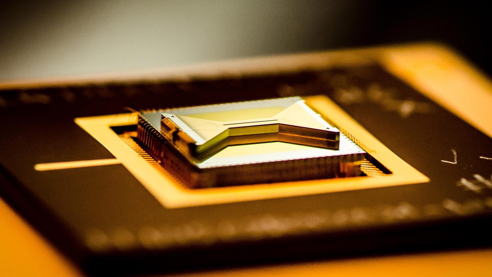Lighting Up the Ion Trap: Fiber Optics Built Into a Chip for Quantum ...