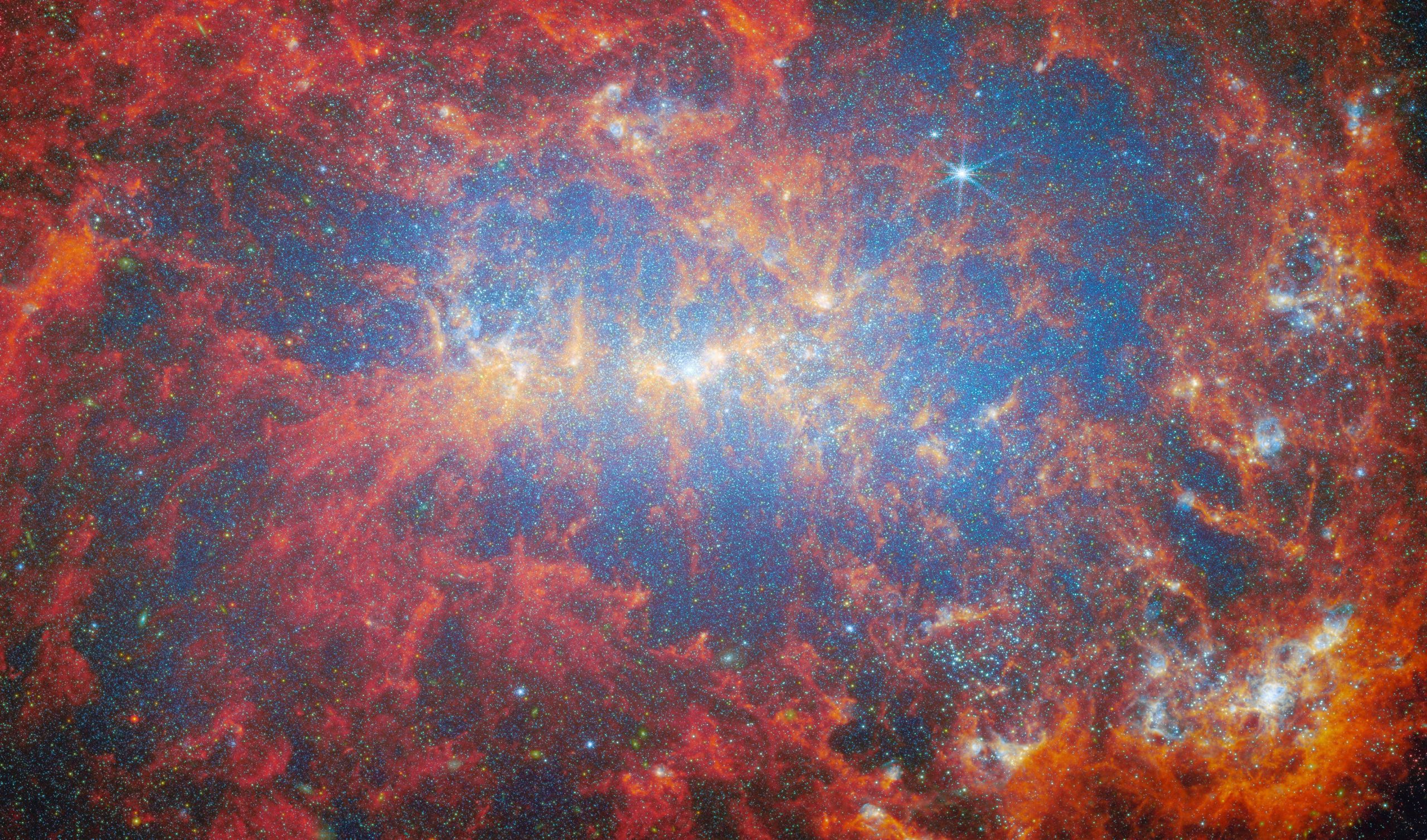 Stellar Fireworks in a Tiny Galaxy: Webb and Hubble Reveal Starburst Secrets